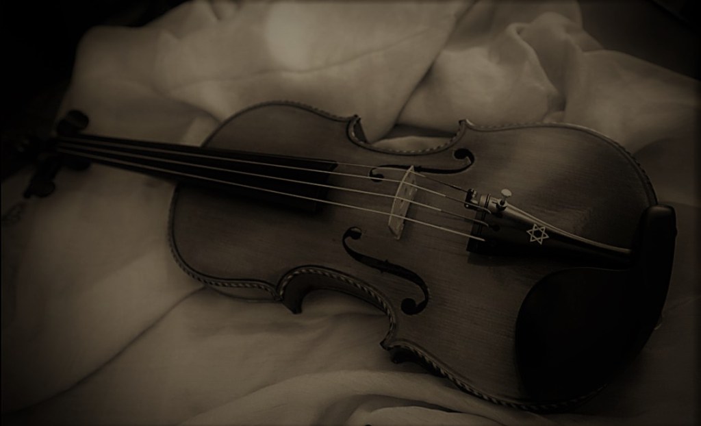 A violin to silence the violence. – History of Sorts